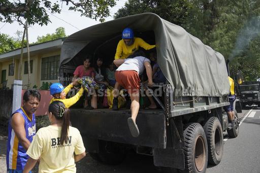 Philippine villagers flee ashfall, sight of red-hot lava from erupting ...