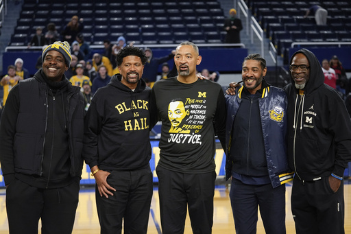Michigan's Fab Five reunites to support Howard, attends 1st basketball ...