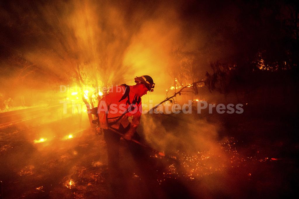 Firefighters gain ground against Southern California wildfire but face ...