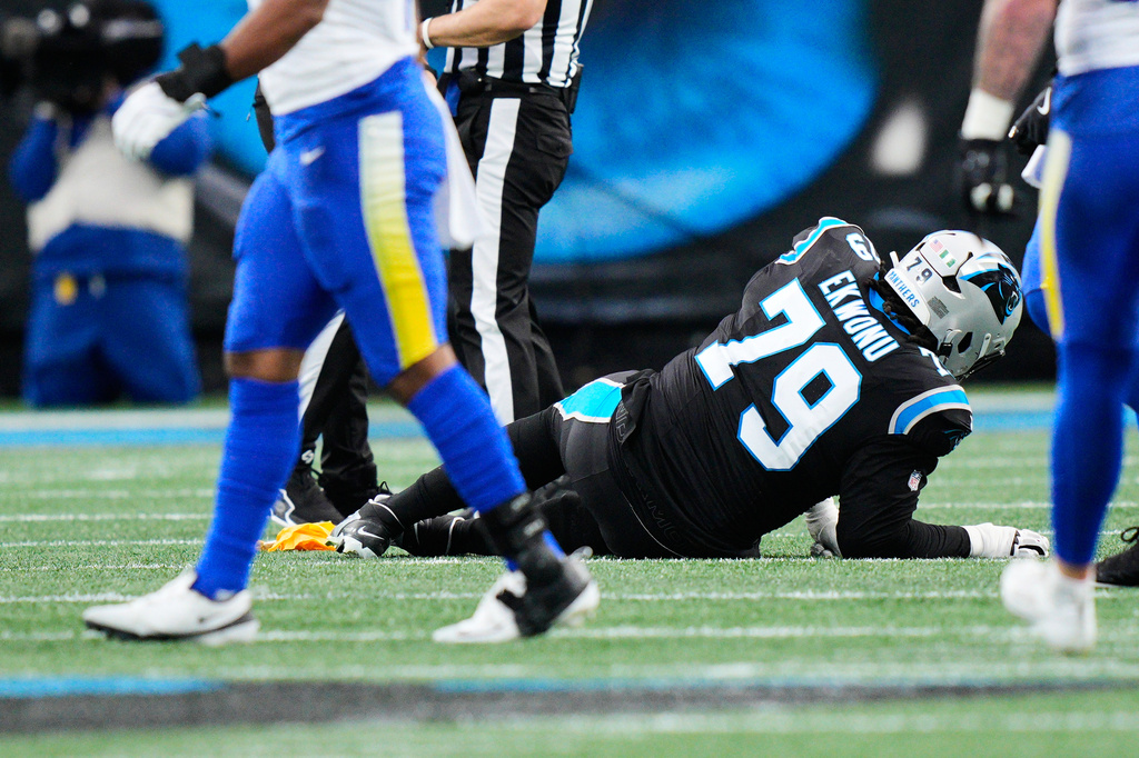 Panthers starting left tackle Ickey Ekwonu out after right knee injury ...