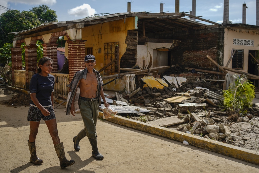 Along Mexico's Pacific coast, flooding from Hurricane John left ...