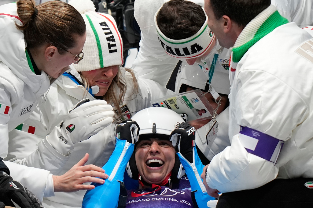 One Extraordinary Photo: Golden moment as Italy celebrates luge win ...