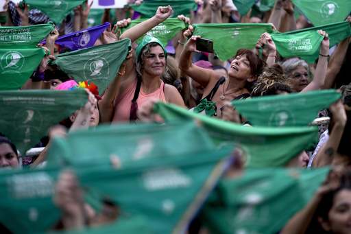 Facing historic shifts, Latin American women bathe streets in purple on ...