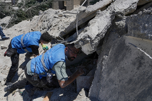 Russia strikes an apartment building in the Ukrainian city of Kharkiv ...