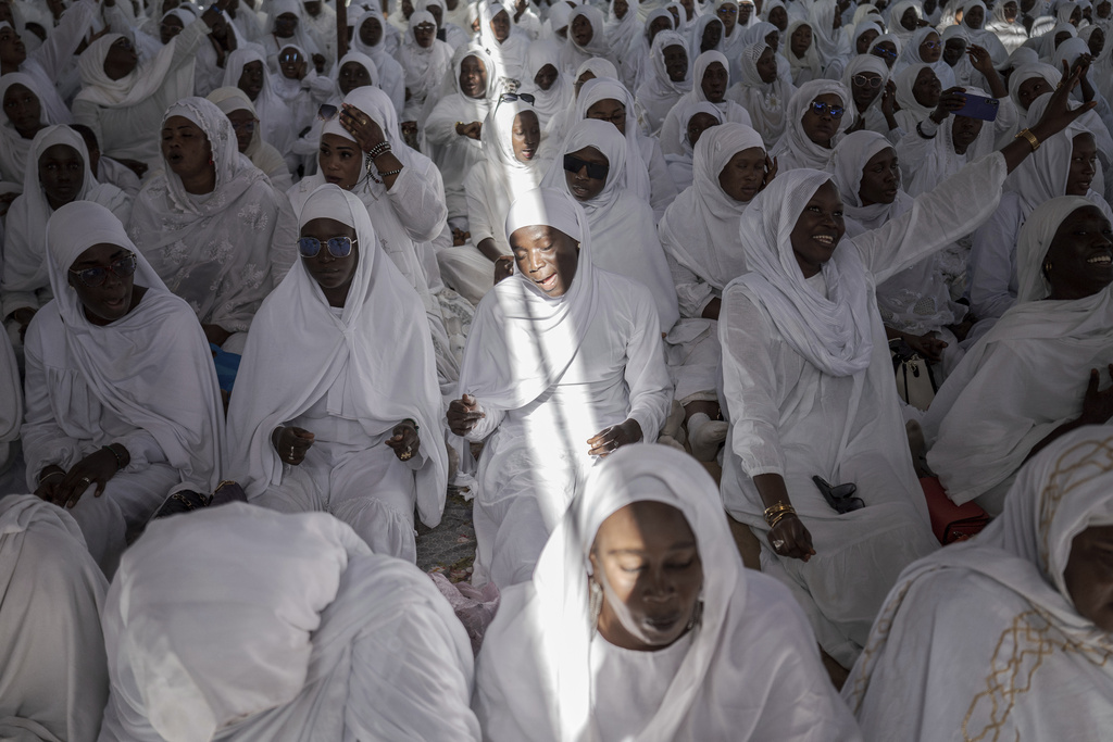 Thousands of followers of a Sufi Muslim brotherhood celebrate a sacred ...