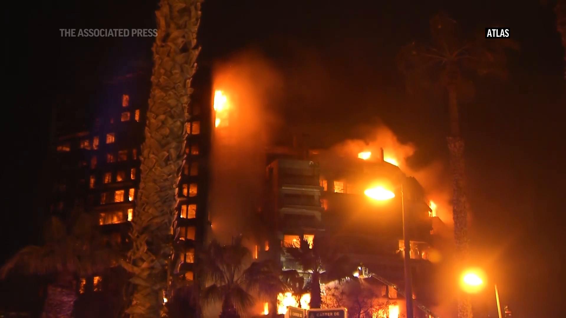 Fire engulfs 2 buildings in Spanish city of Valencia, killing at least ...