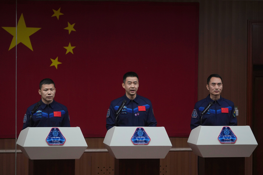 China reveals new team of astronauts for space station launch - Daily ...