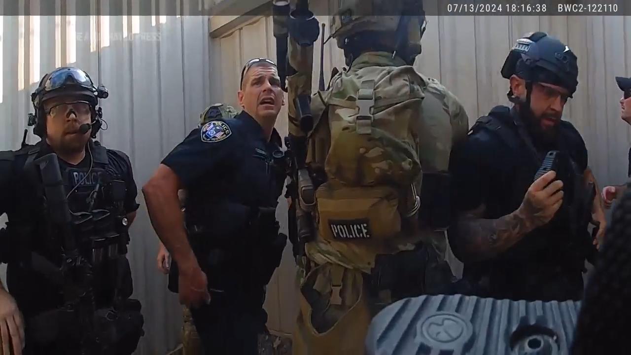 Body camera footage shows local police anger at Secret Service after ...