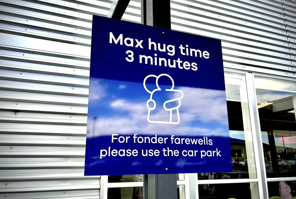 New Zealand airport imposes cuddle cap with 3-minute limit on goodbye ...