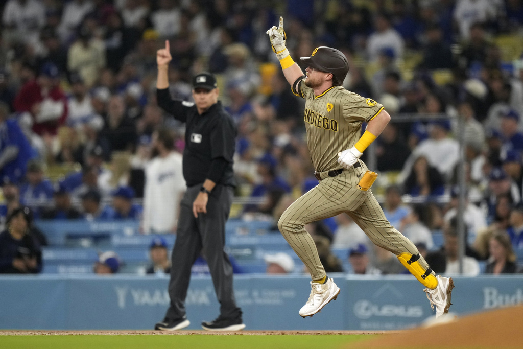 Padres turn triple play to clinch playoff spot with 4-2 win over ...