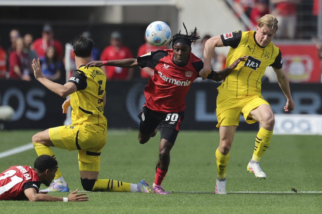 Liverpool signs Dutch right back Jeremie Frimpong from Bayer Leverkusen ...