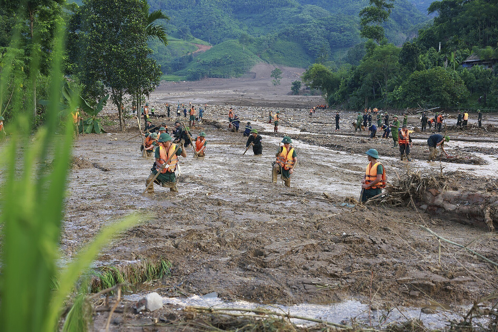 Vietnam typhoon death toll rises to 233 as more bodies found in areas ...